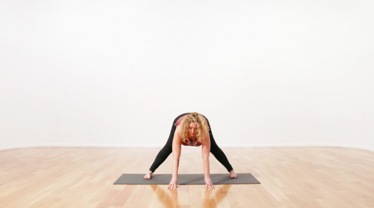 Pose of the Week: Wide Leg Forward Fold – Glo | Blog